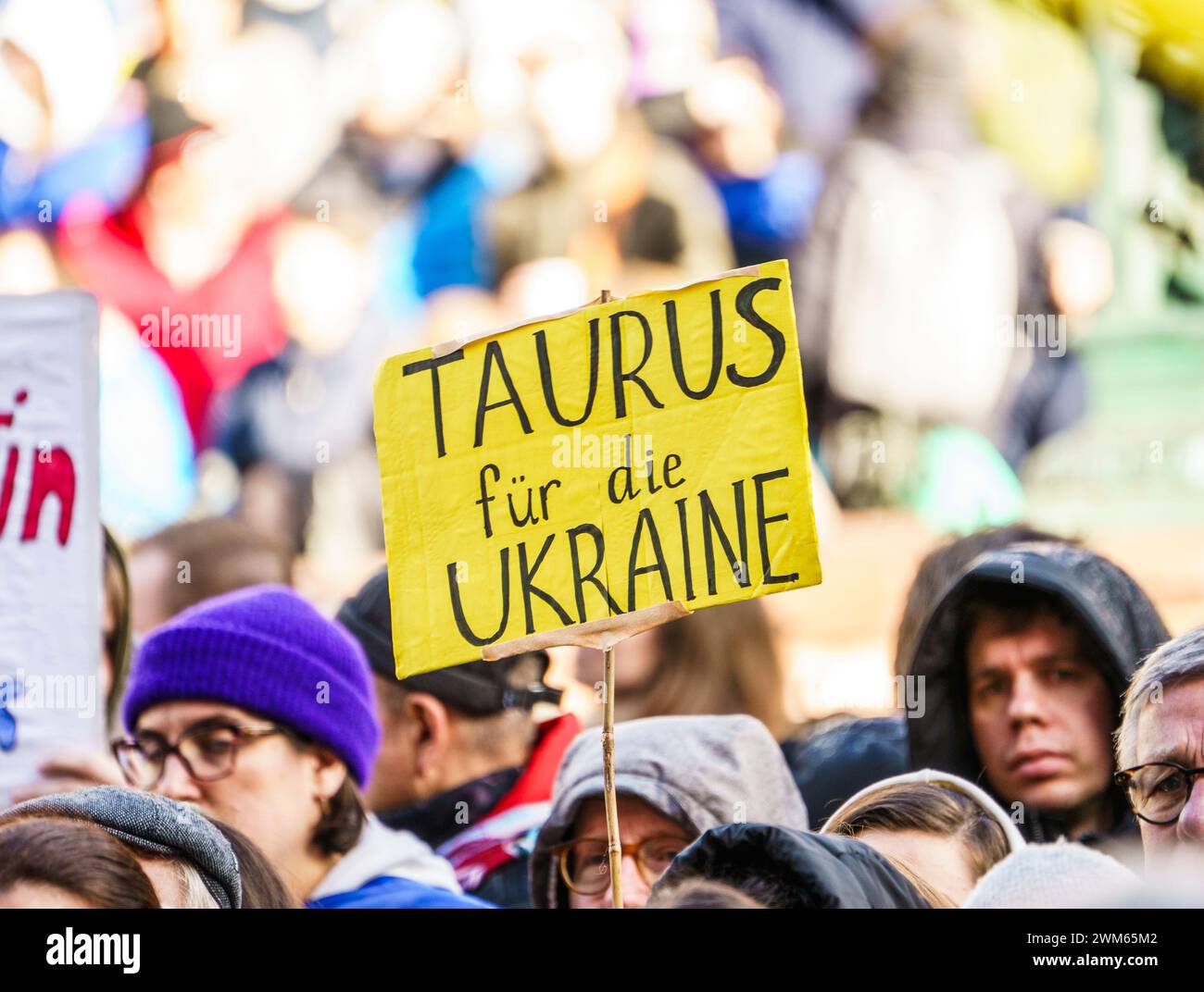 24 February 2024, Hesse, Frankfurt/Main: Rally participants demand the ...