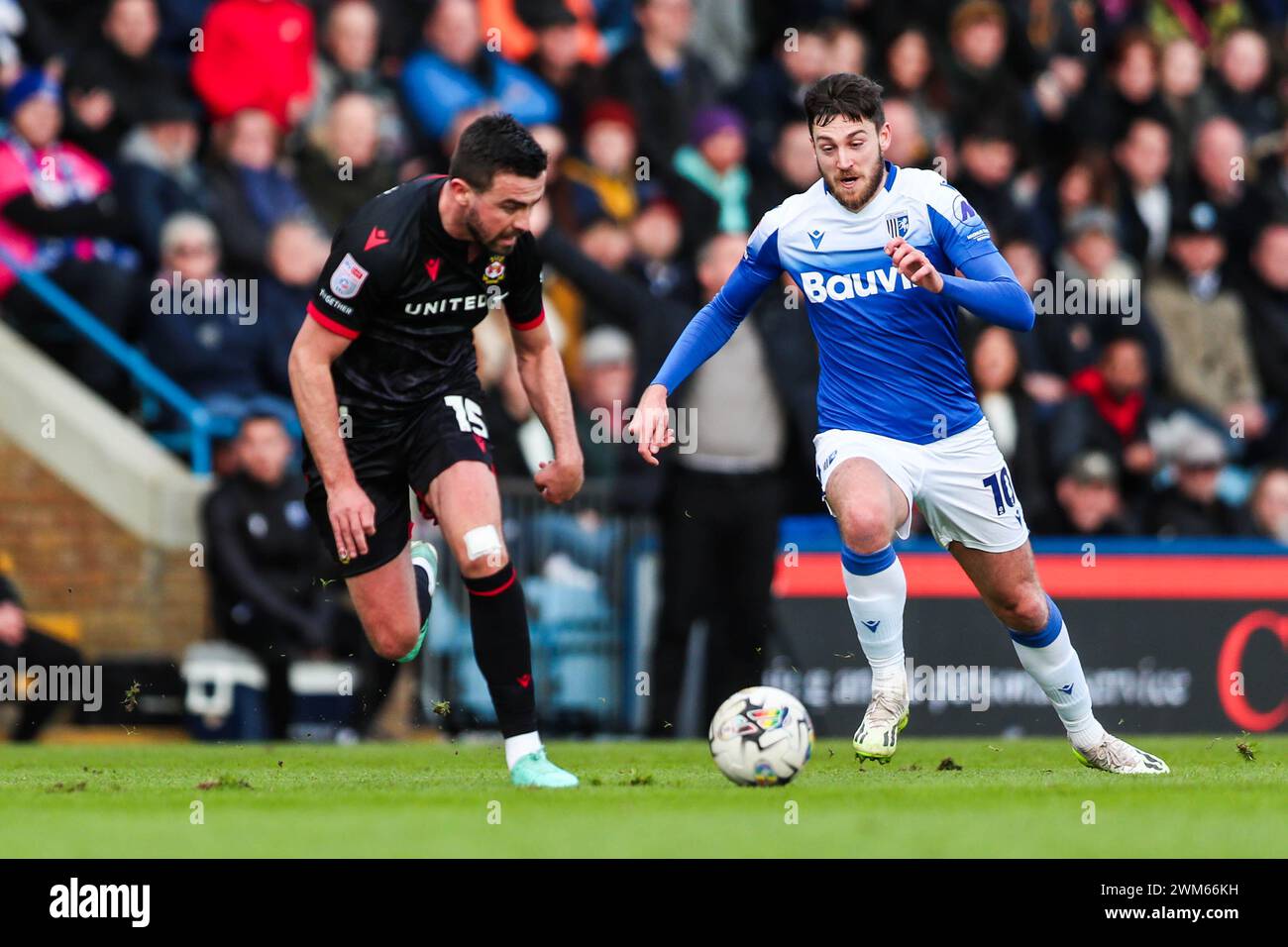 Gillingham's Ashley Nadesan battles for the ball against Wrexham's Eoghan O'Connell during the ...