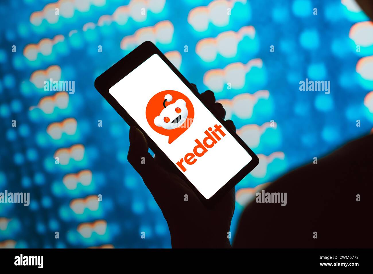 In this photo illustration, the Reddit logo is displayed on a ...
