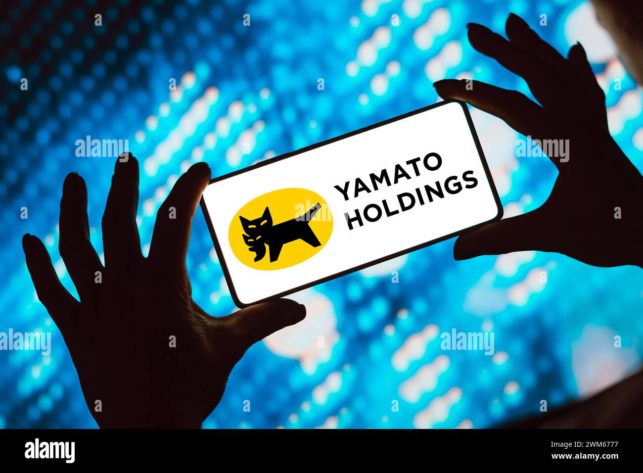 In this photo illustration, the Yamato Holdings logo is displayed on a ...