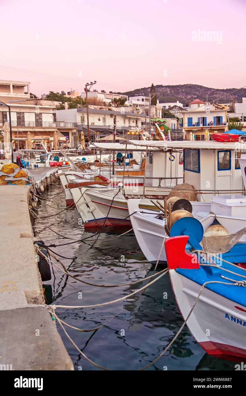 View of Souvala port, a small coastal settlement with fishing boats, at ...