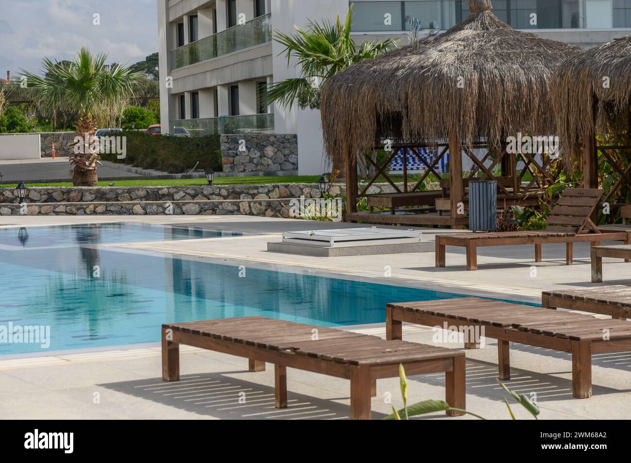 bungalows and beach chairs near the pool and cafe in Cyprus 1 Stock ...