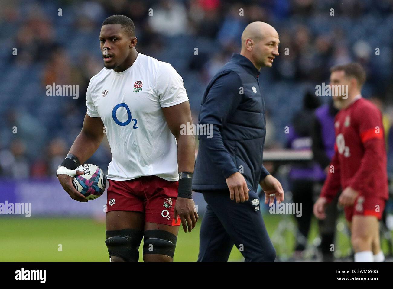 England's Maro Itoje stands alongside England's Head Coach Steve Borthwick during the warm-up ...