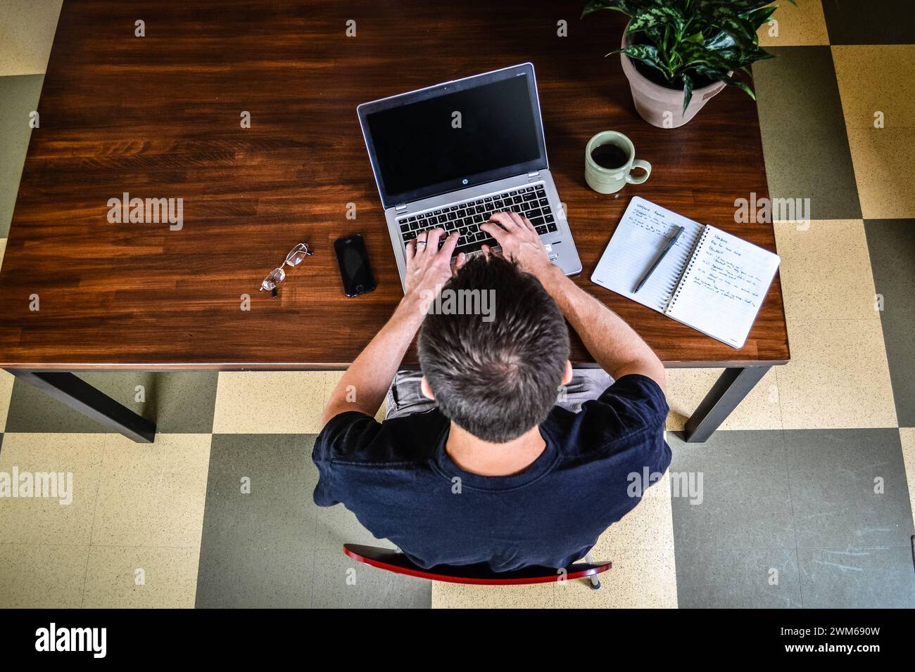 Overhead view man typing hi-res stock photography and images - Alamy