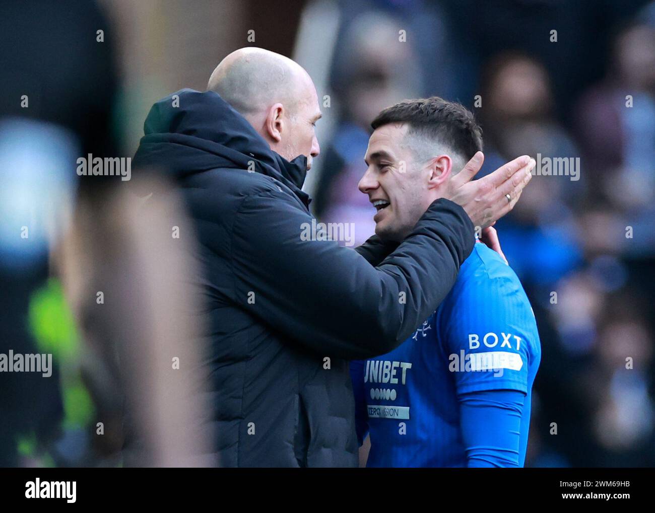 Rangers manager Philippe Clement greets Tom Lawrence as he is ...