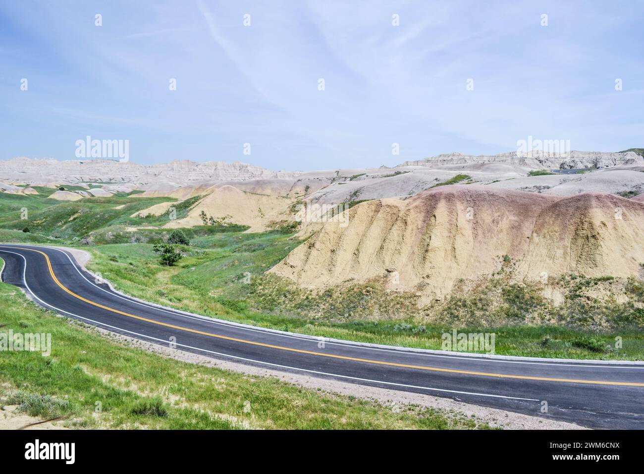 Curvy road leading past rocky landscape Stock Photo - Alamy