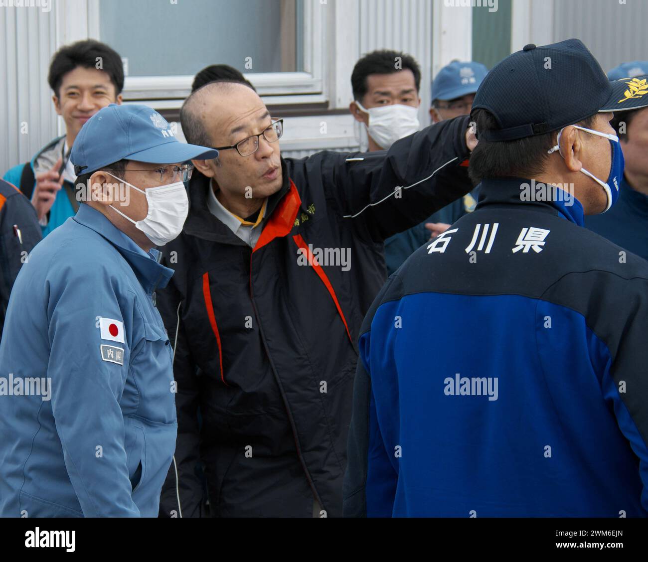 Wajima, Japan. 24th Feb, 2024. Japan's Primes Minister Fumio Kishida(L ...