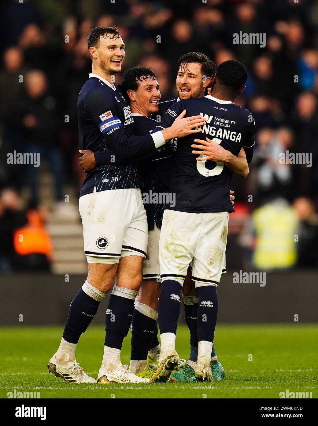 Millwall's Jake Cooper (far left) celebrates with George Honeyman (left ...
