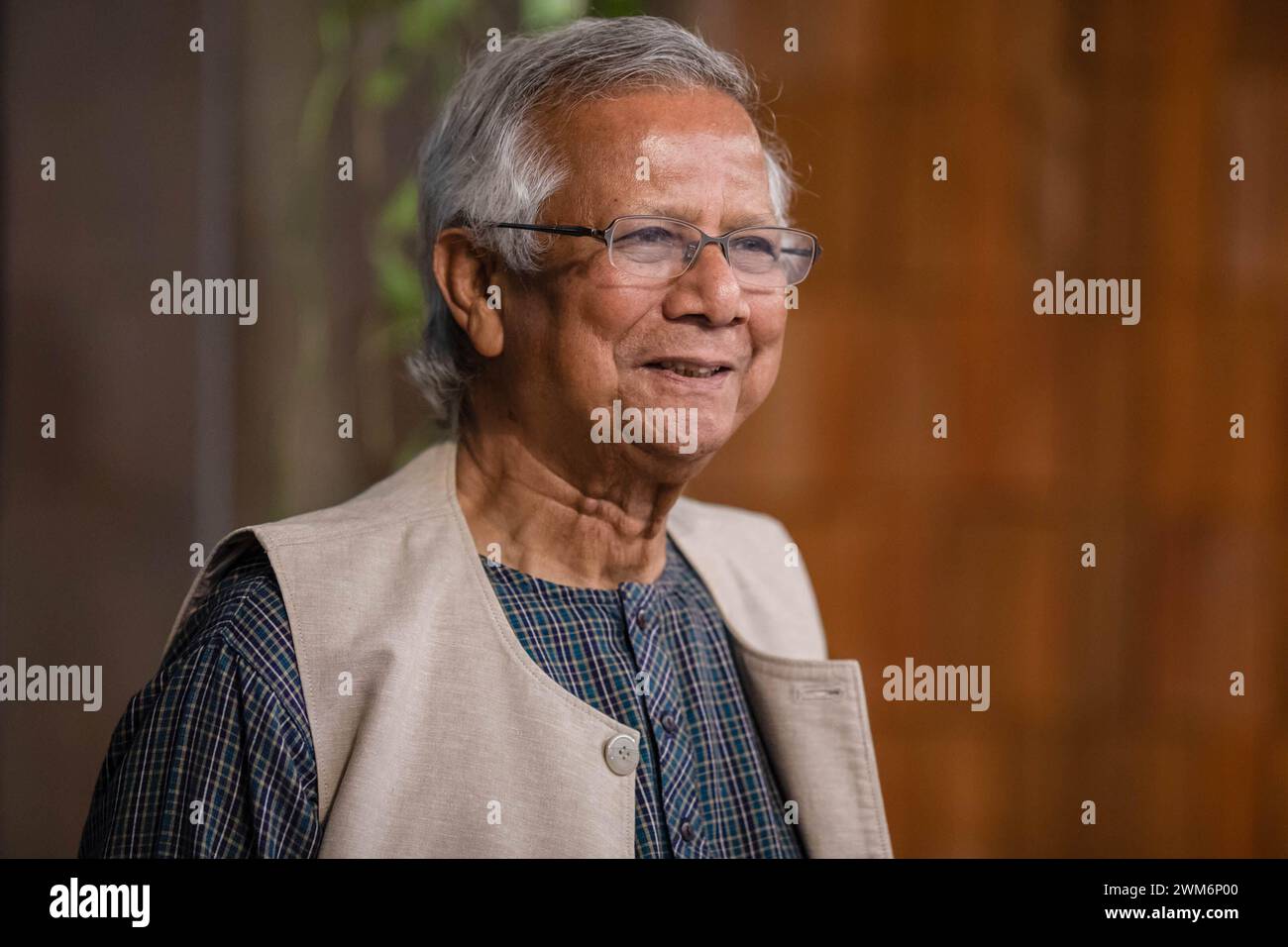 Dhaka, Bangladesh. 23rd Feb, 2024. Dr Muhammad Yunus poses for photos ...
