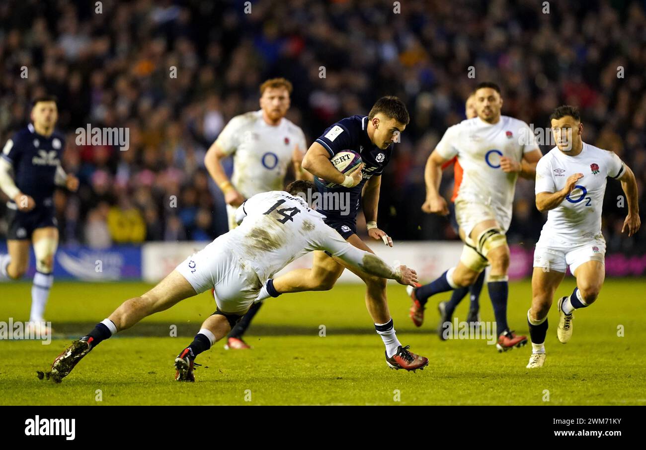 Scotland's Cameron Redpath (centre) is tackled by England's Tommy ...