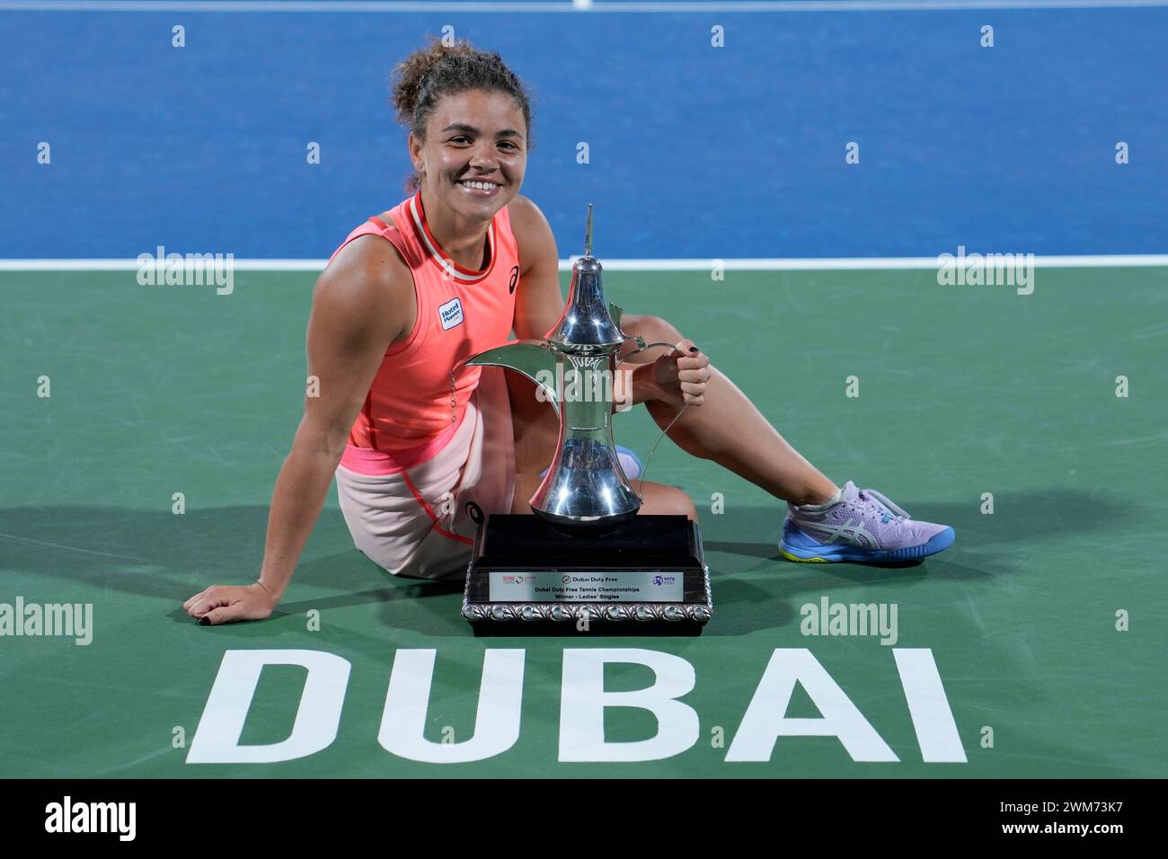 Jasmine Paolini of Italy poses for a photograph with her trophy after ...