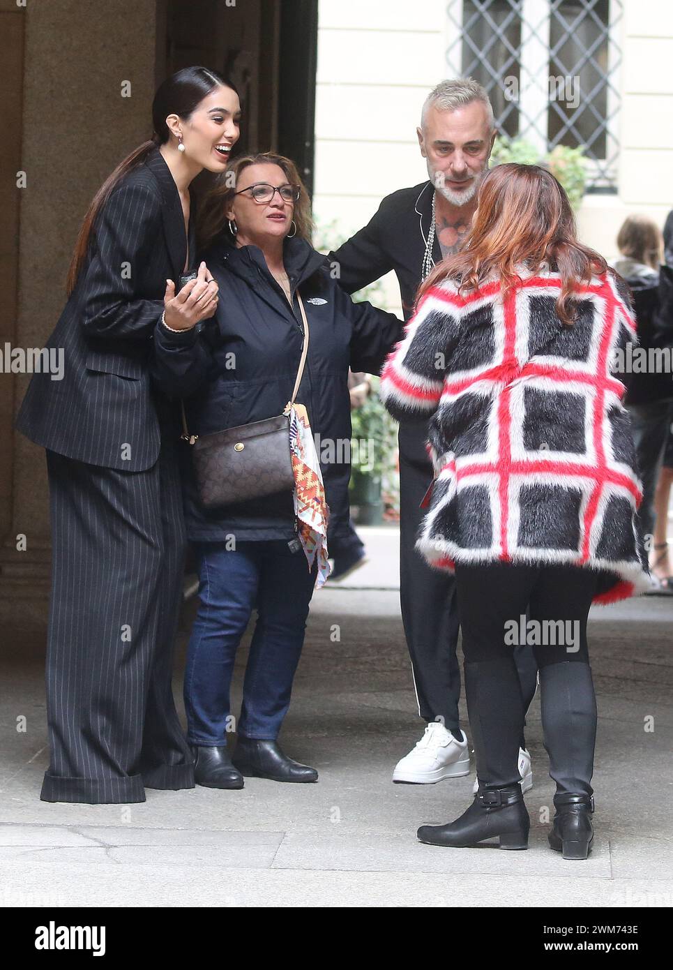Milan, It. 24th Feb, 2024. Gianluca Vacchi accompanies his wife Sharon ...