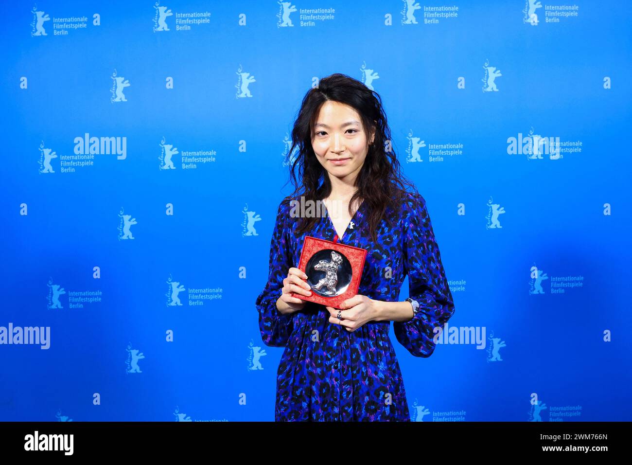 Berlin, Germany. 24th Feb, 2024. Wenqian Zhang poses with the Silver Bear, the jury prize, for ...