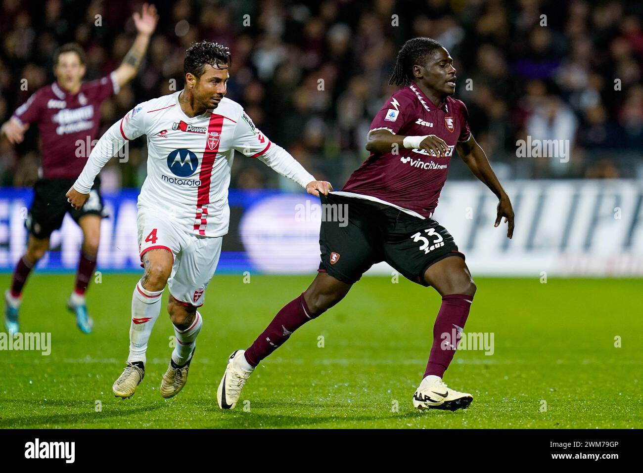 Armando Izzo of AC Monza and Loum Tchaouna of US Salernitana compete ...