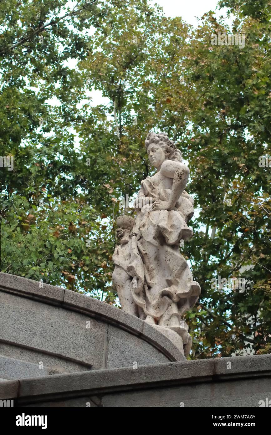 Defiance in Stone: Woman with Goblet Stock Photo - Alamy
