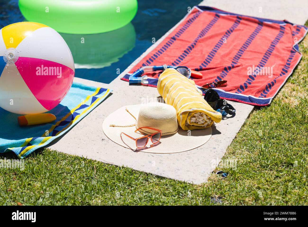 A colorful beach setup on the grass, with copy space Stock Photo - Alamy