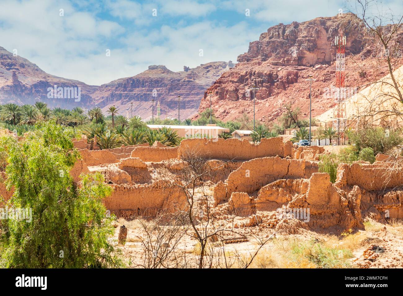 Al Ula ruined arab village houses ruins with road and rocky landscape ...