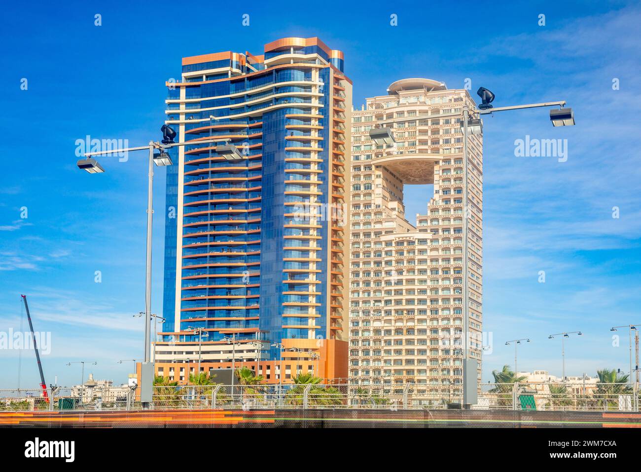 Residential and business buildings at the corniche with race track ...