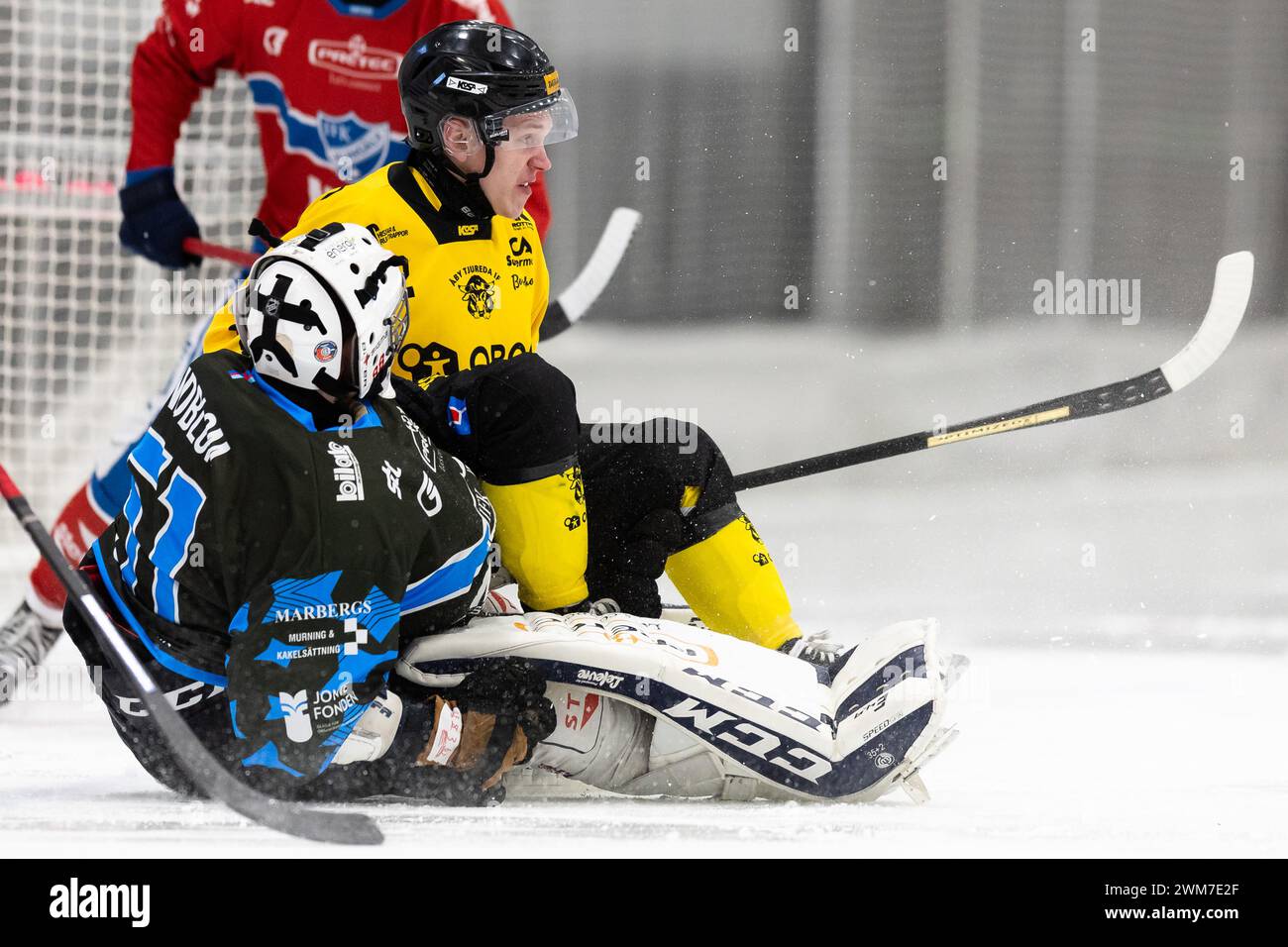 240224 Åby Tjuredas Filip Johansson och Kungälvs målvakt Axel Garstam ...