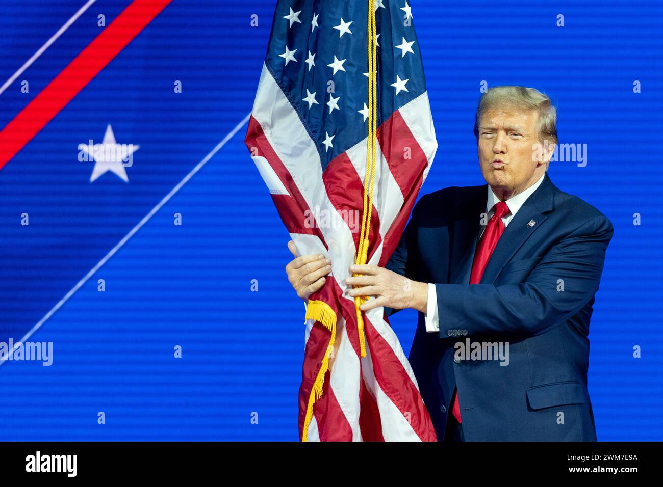 Republican presidential candidate former President Donald Trump reaches ...