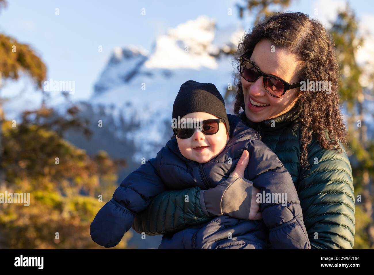 Baby boy and mother happy outside in nature. Squamish, BC, Canada Stock ...
