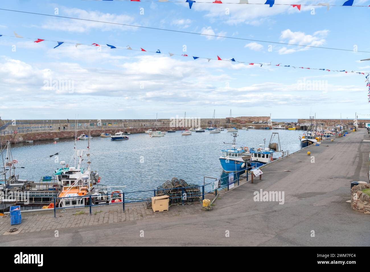 Commercial fishing and pleasure boats in Dunbar Harbour, Scotland ...