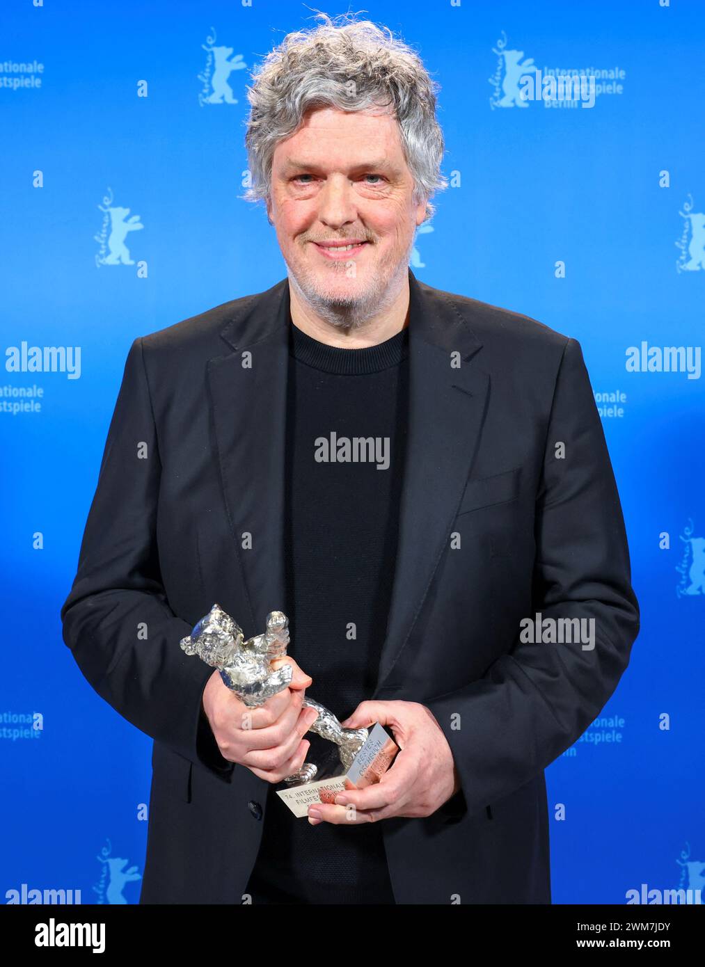 Berlin, Germany. 24th Feb, 2024. Matthias Glasner poses with the Silver ...