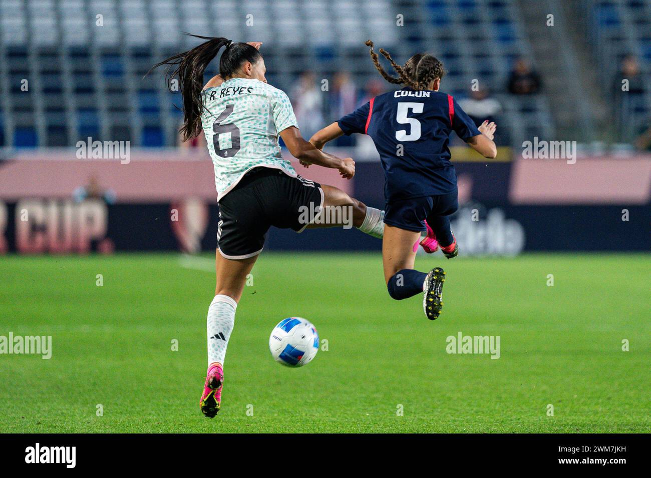 Mexico defender Reyna Reyes (6) and Dominican Republic defender Nadia ...