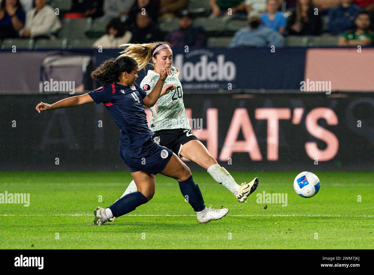 Mexico forward Mayra Pelayo (20) scores a goal against Dominican ...