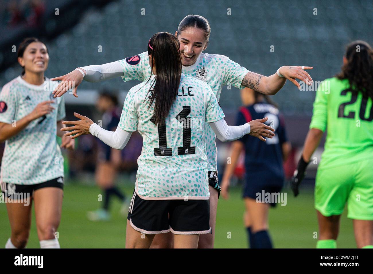 After scoring a goal, Mexico midfielder Jacqueline Ovalle (11 ...