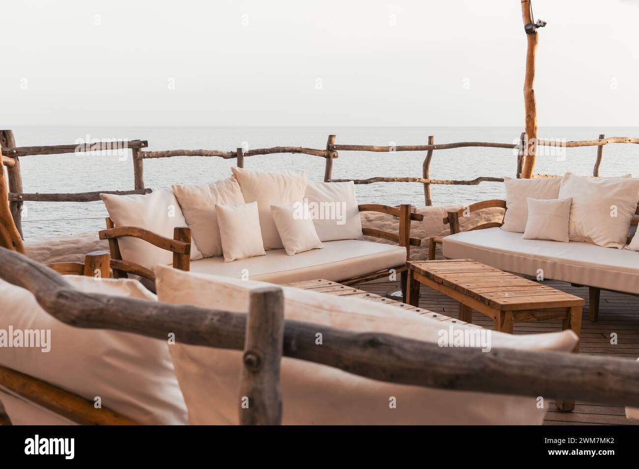 Reserved VIP area with white sofas on the terrace of a luxury hotel ...