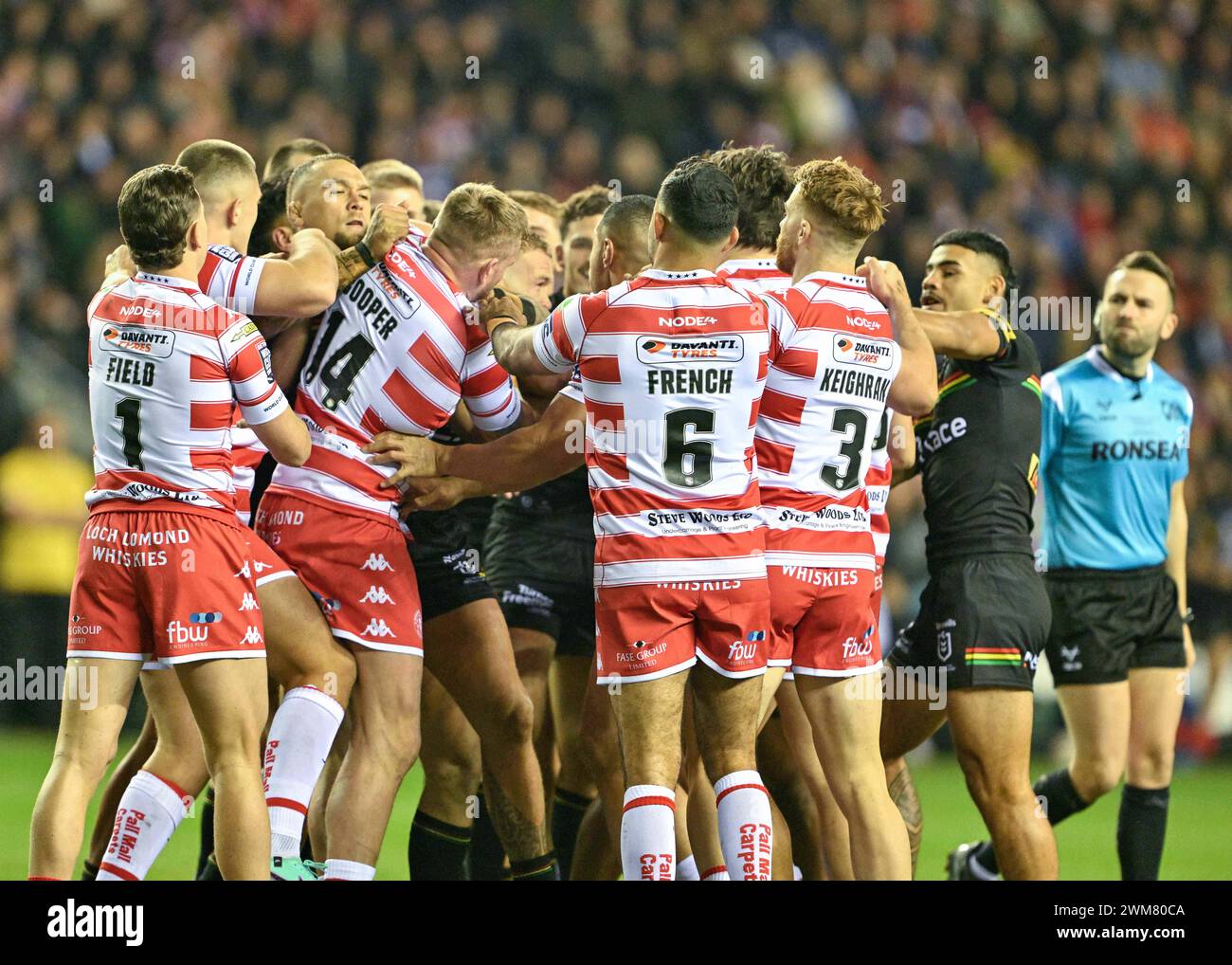 Wigan, UK. 24th Feb, 2024. Tempers spill over as the two teams clash ...