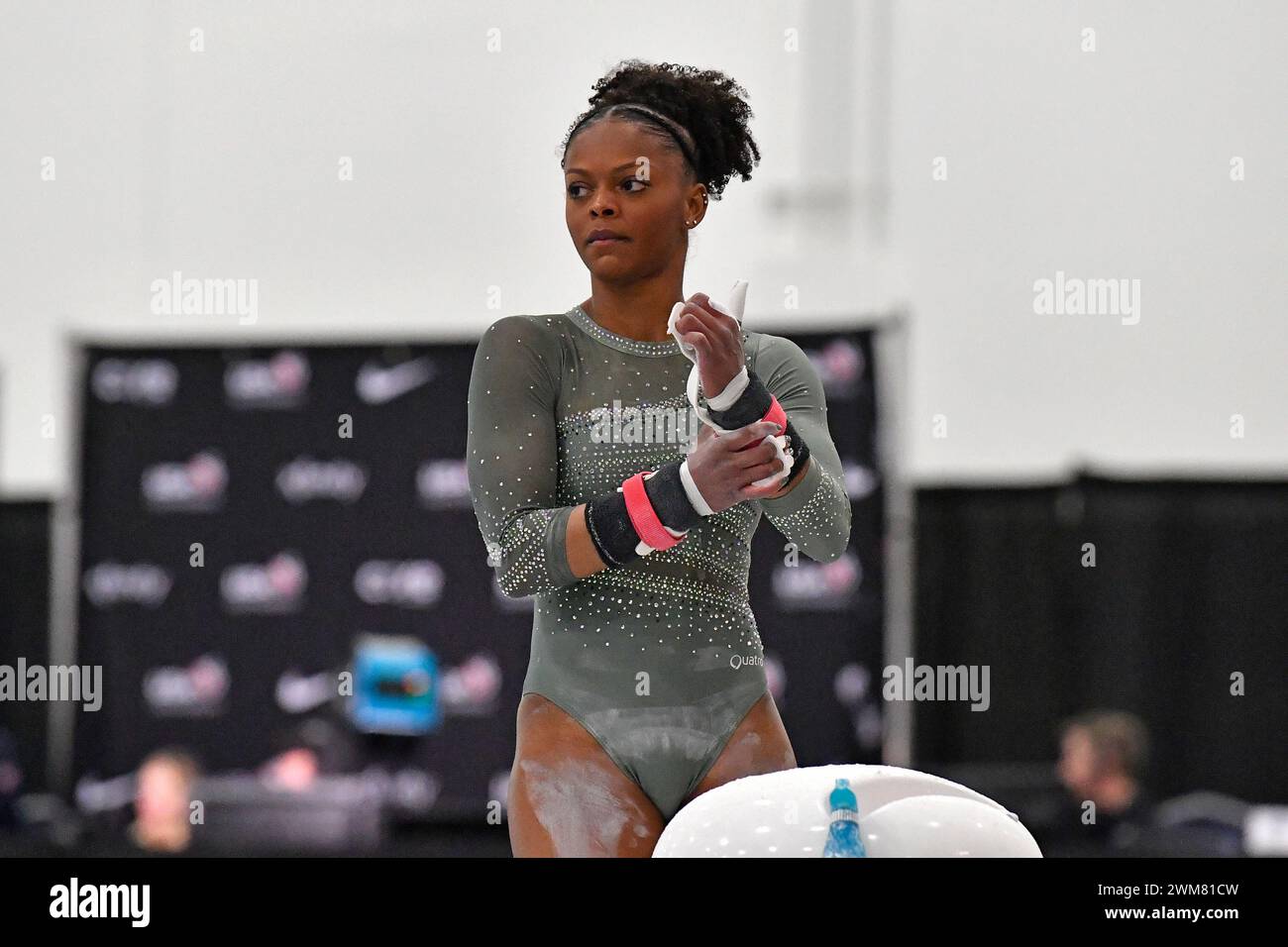 Trinity Thomas gets ready to perform on the uneven bars at the USA ...