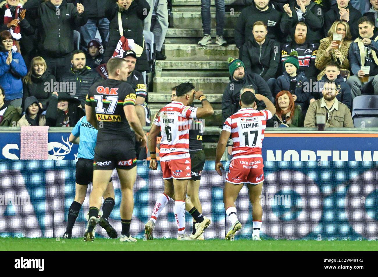 Kruise Leeming of Wigan Warriors celebrates his try to make it 8-4 ...