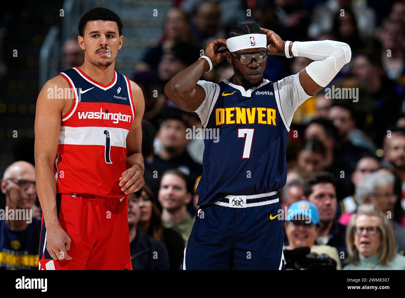 Denver Nuggets guard Reggie Jackson (7) and Washington Wizards guard ...
