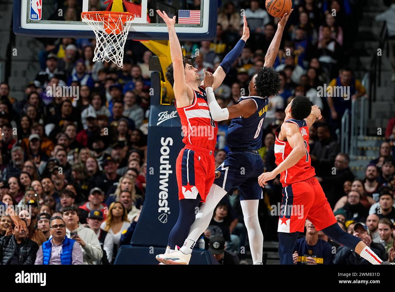 Denver Nuggets forward Peyton Watson (8) goes up for a basket between ...