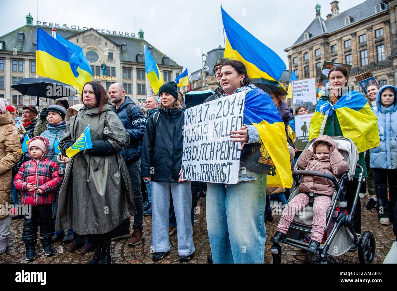 Amsterdam, Netherlands. 24th Feb, 2024. Protesters hold Ukrainian flags ...
