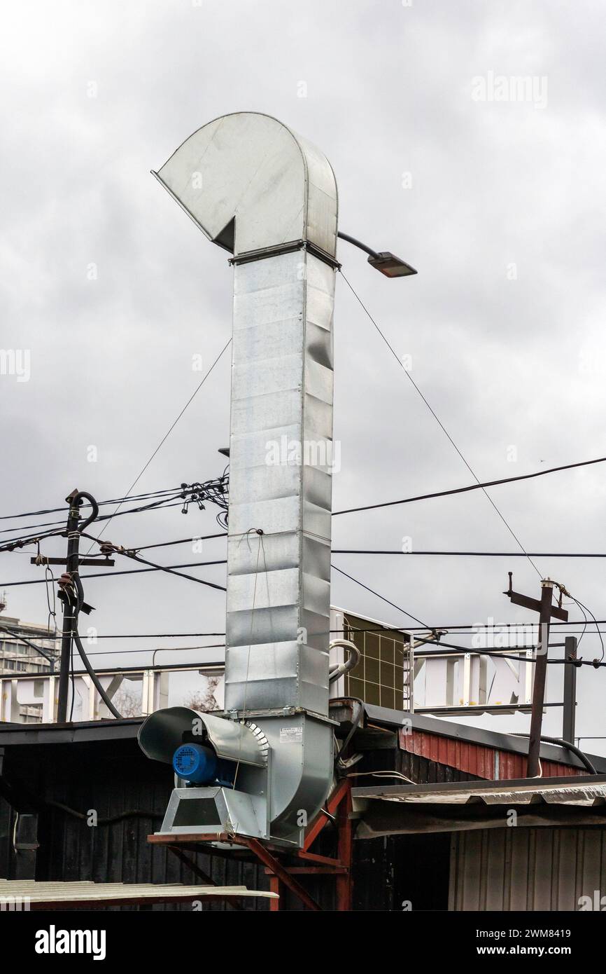 Exhaust vents on air duct chimney outside on urban street Stock Photo ...