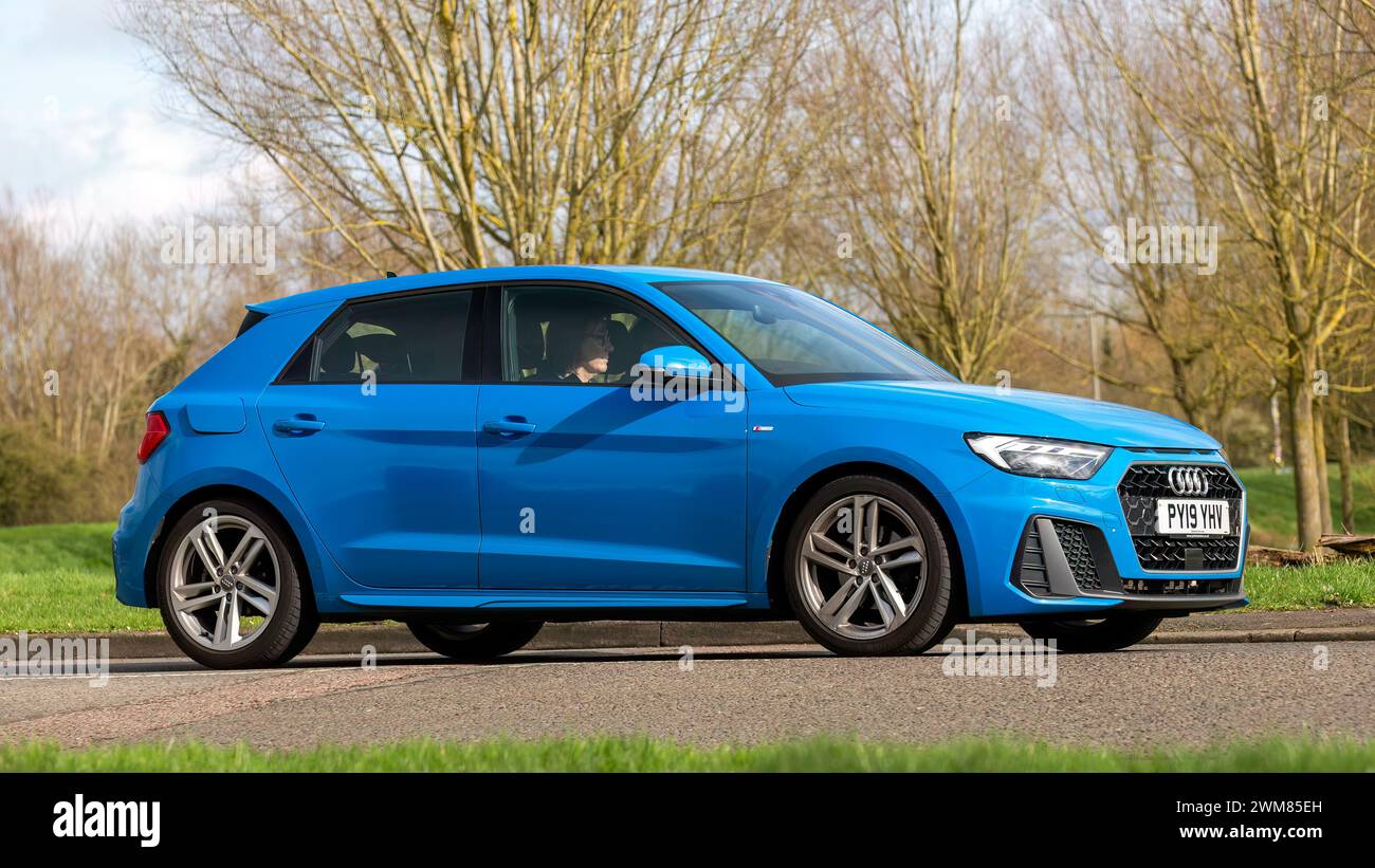 Milton Keynes,UK-Feb 23rd 2024:2019 blue Audi A1 car driving on an ...
