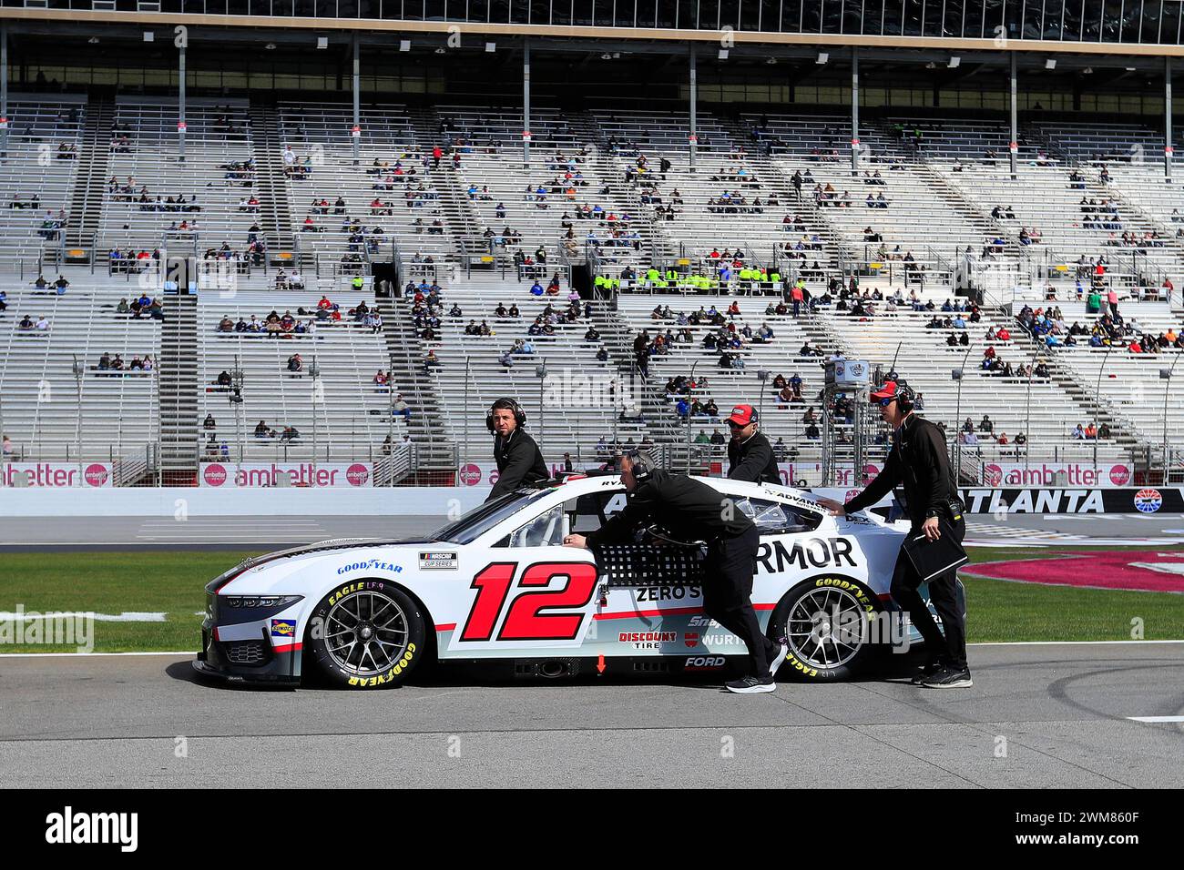 HAMPTON, GA - FEBRUARY 24: The crew of the Ryan Blaney (#12 Team Penske ...