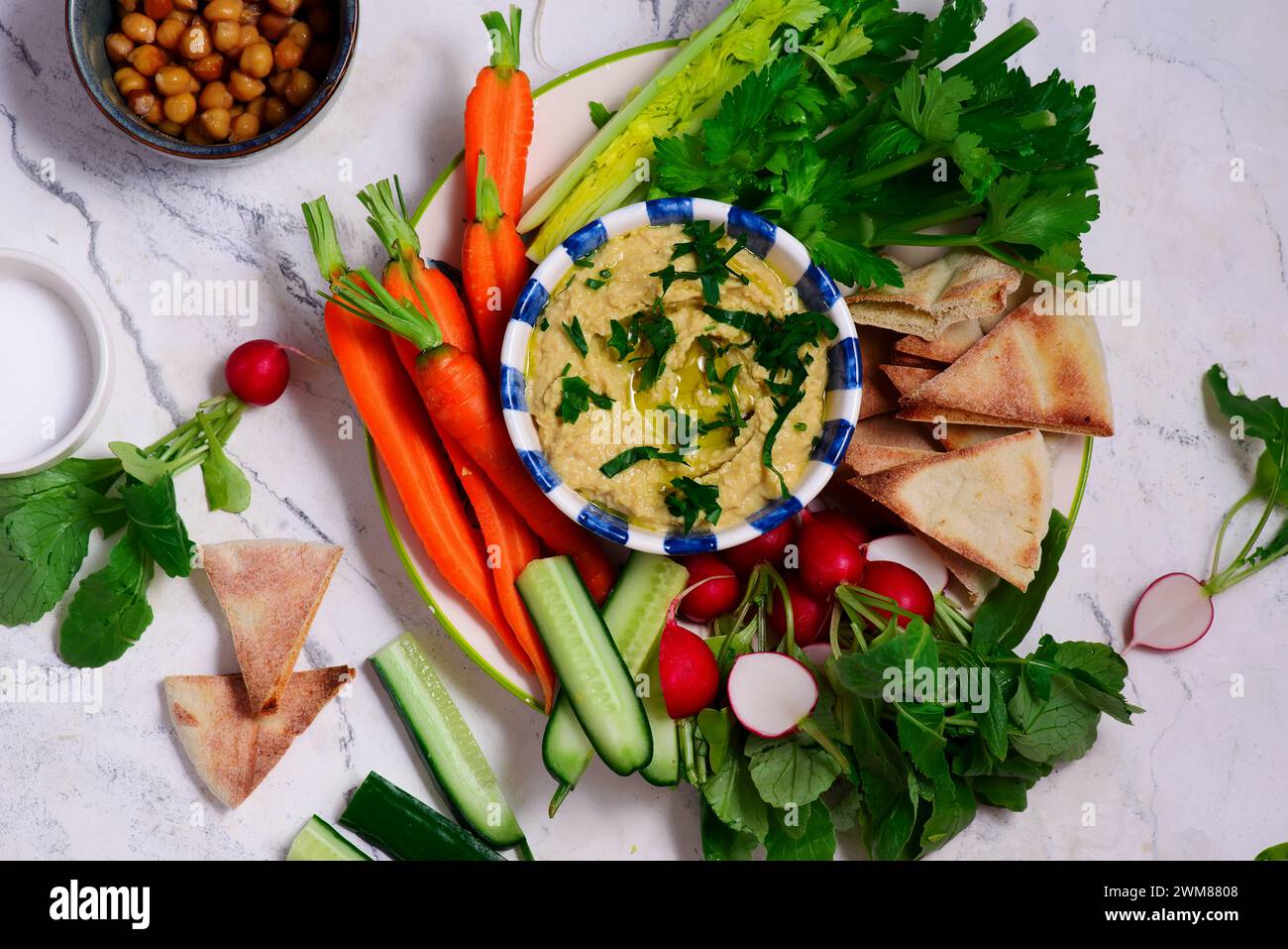 Hummus with fresh crispy vegetables. top view..selective focus Stock ...