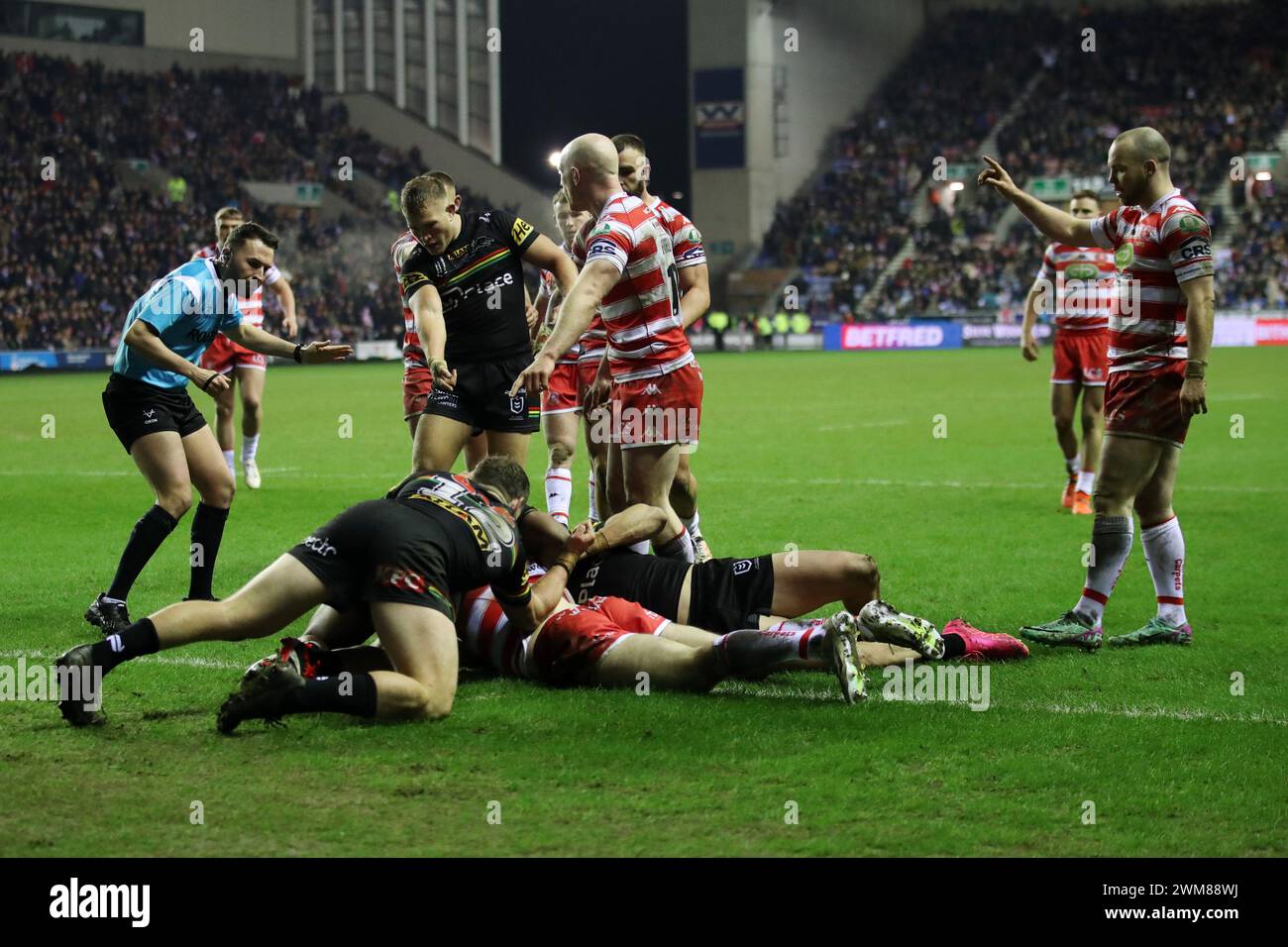 Wigan Warriors' Jake Wardle scores his sides third try during the ...