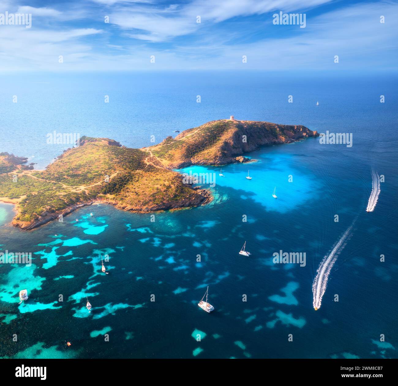 Aerial view of island, sea bay with clear azure water, boats Stock ...
