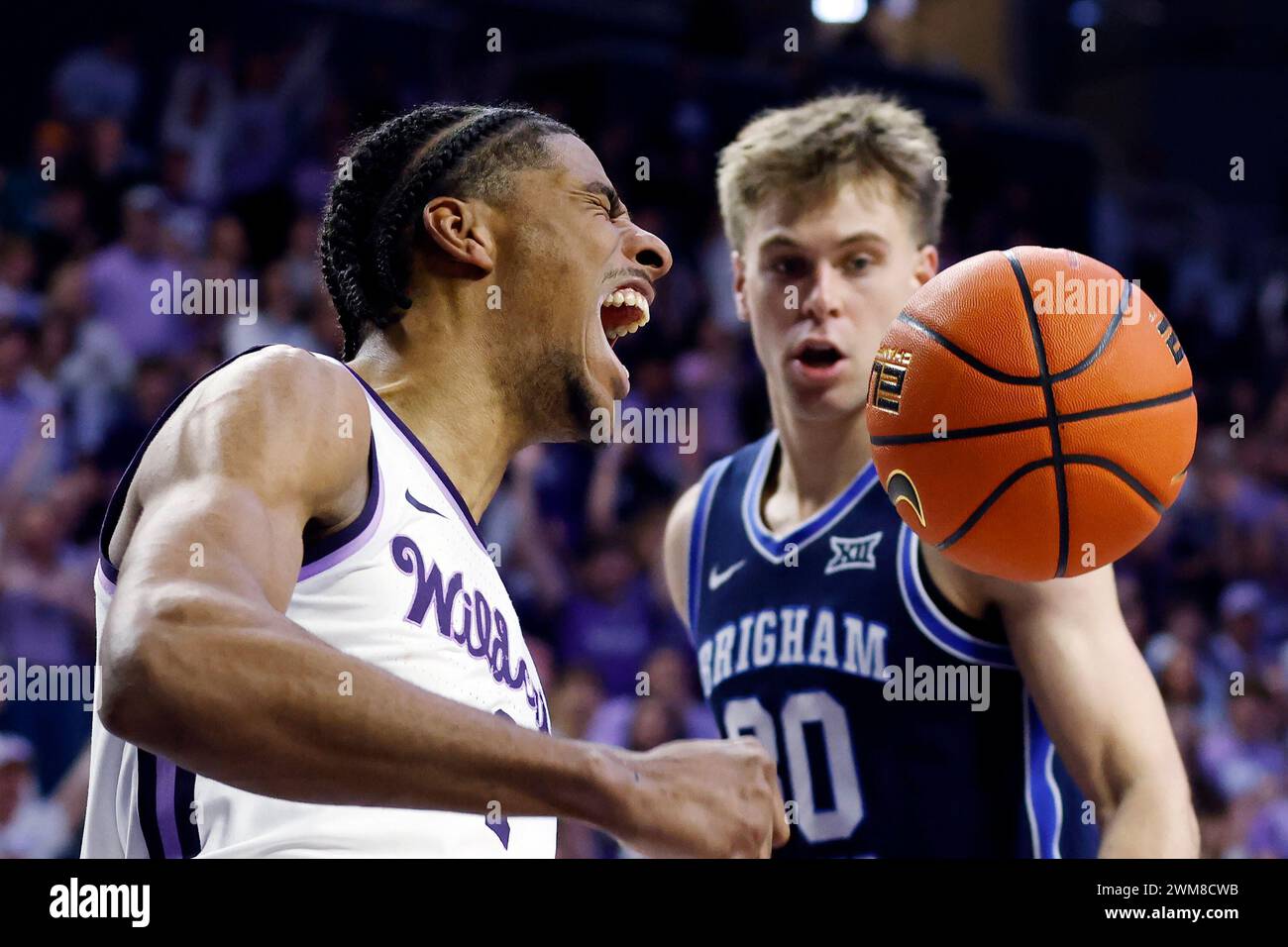 Kansas State forward David N'Guessan (1) reacts after scoring as BYU ...