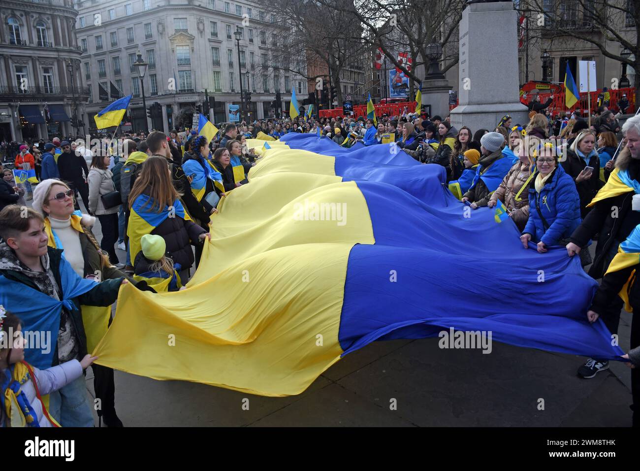 London, UK. 24th Feb, 2024. Ukrainians rally in Trafalgar Square on the ...