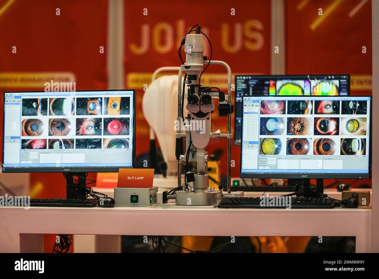 London, UK. 24th Feb, 2024. Monitors show various images of eyes and ...