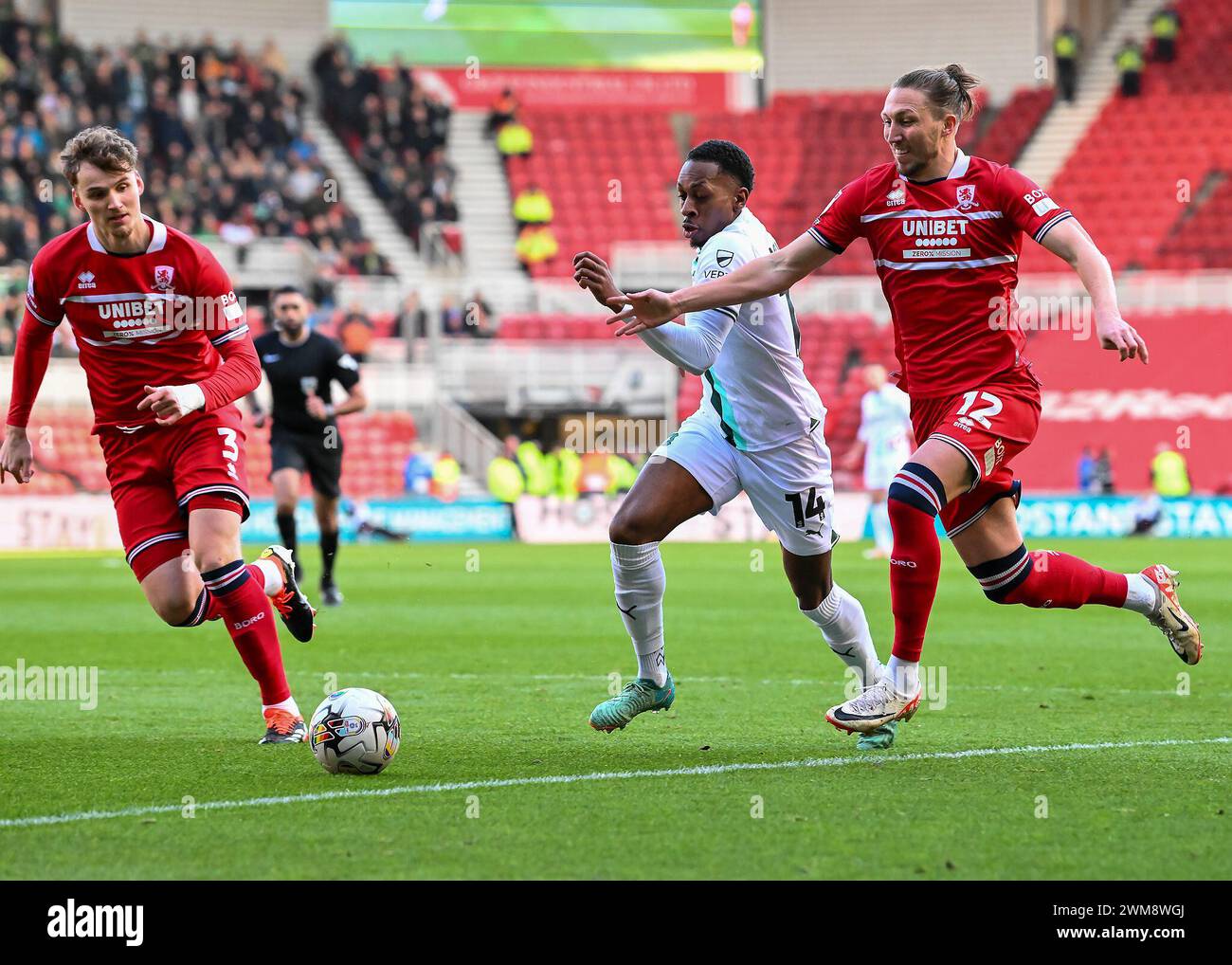 Mickel Miller of Plymouth Argyle goes past Luke Ayling of Middlesbrough ...