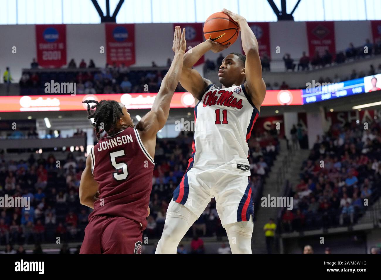 Mississippi guard Matthew Murrell (11) attempts a three-point shot over ...
