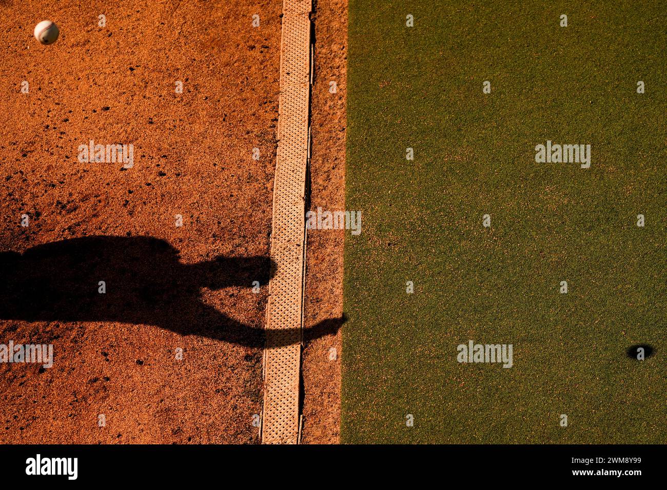 Texas Rangers starting pitcher Nathan Eovaldi warms up in the bullpen ...