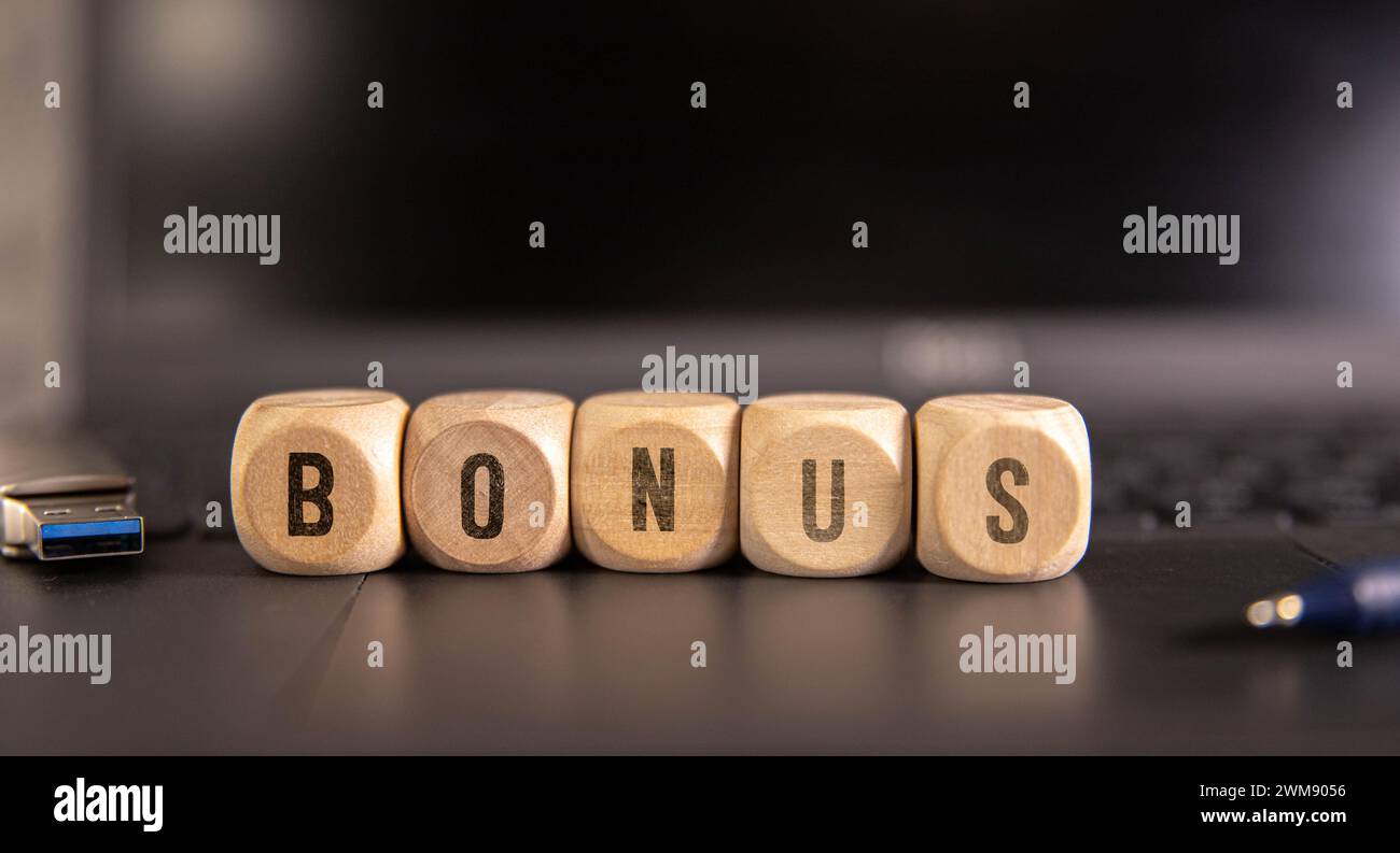 BONUS word made with building blocks Stock Photo - Alamy